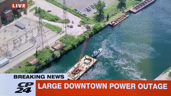 Major power outage in Toronto's downtown core caused by crane on a ...